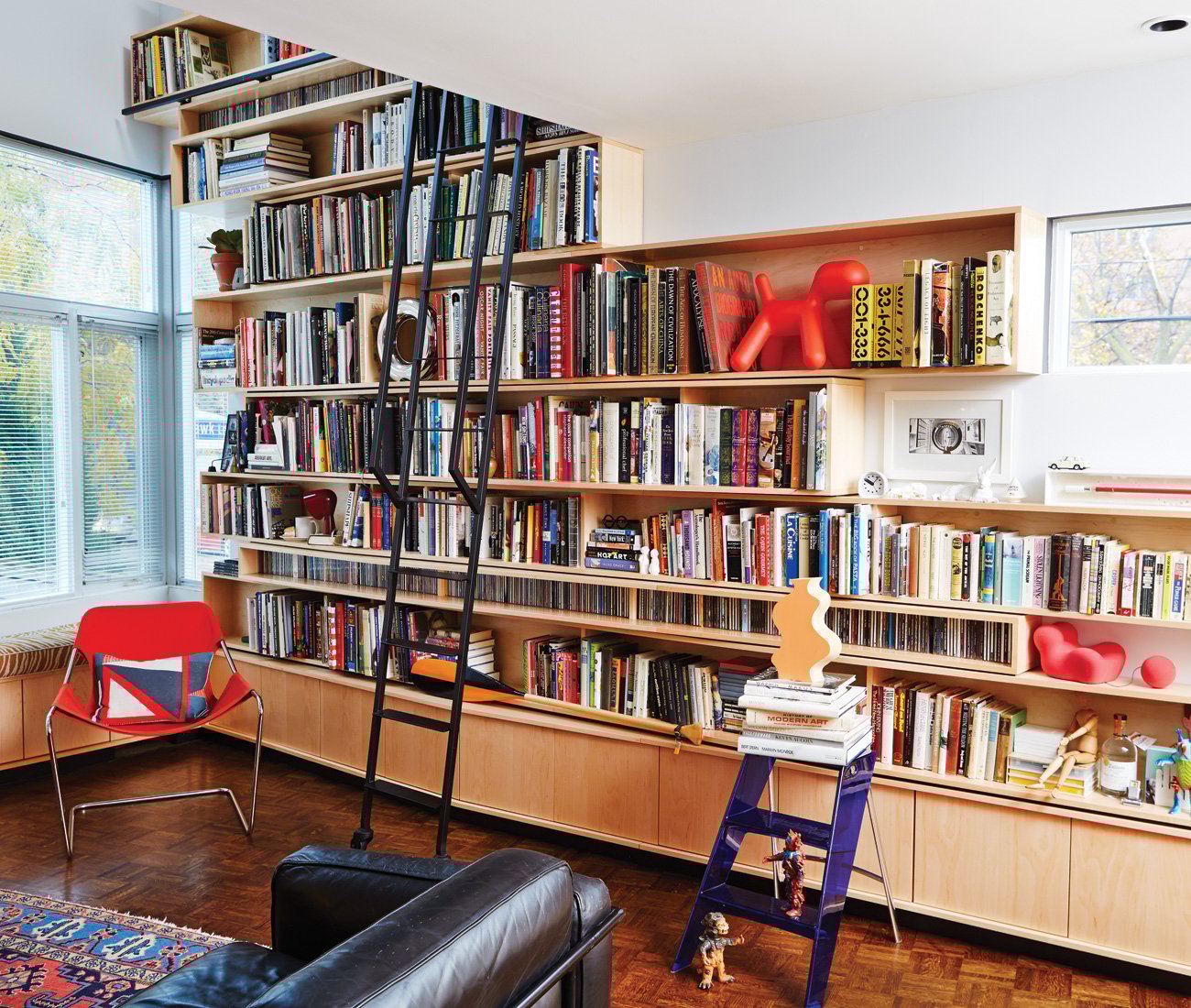 Architect Luc Bouliane's Overflowing Bookcase Design | Designlines Magazine